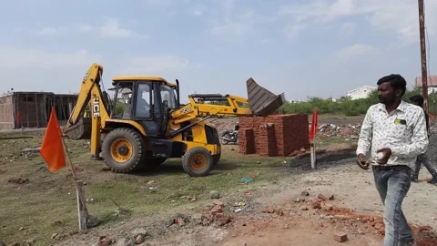 JCB Crane loading construction material ... | Stock Video | Pond5