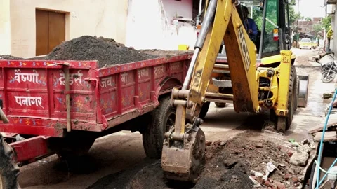 JCB Crane loading construction material ... | Stock Video | Pond5