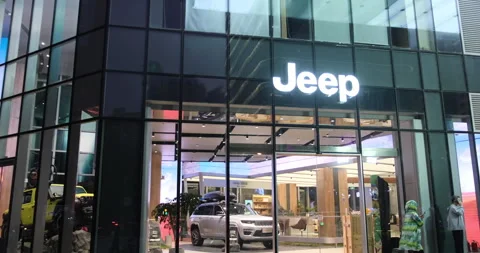 Jeep car dealership retail store at nigh... | Stock Video | Pond5