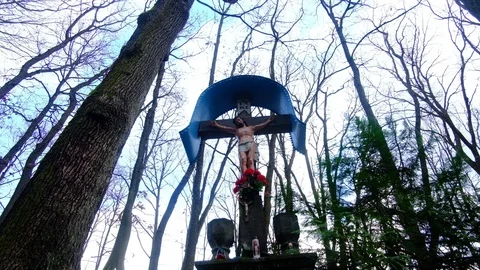 Jesus Christ Statue at Forest Altar | Stock Video | Pond5