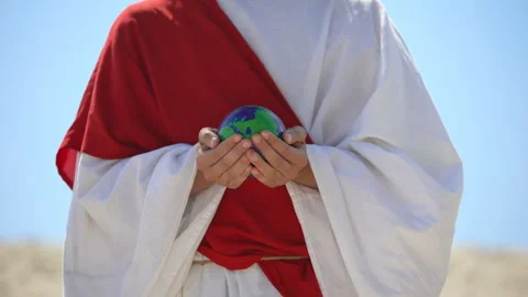 Jesus holding Earth planet, love for wor... | Stock Video | Pond5