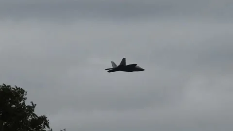 Jet Airplane Descending Airshow Behind F... | Stock Video | Pond5