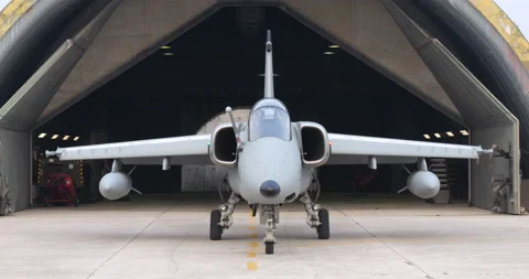Jet fighter plane from front and hangar ... | Stock Video | Pond5