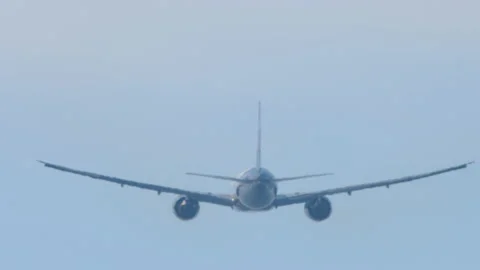 Jet plane in the sky, rear view | Stock Video | Pond5