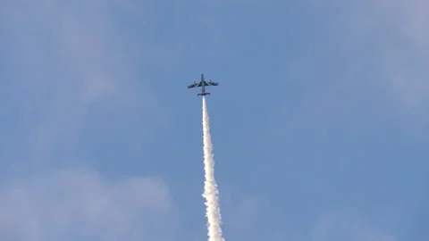 Jet plane solo performs a tailslide bell... | Stock Video | Pond5