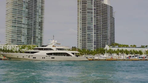 Jet ski near Miami Beach's skyscrapers | Stock Video | Pond5