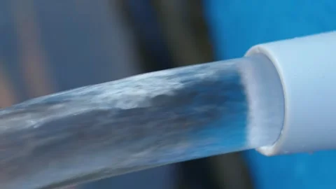 Jet of water flows out of a blue swimmin... | Stock Video | Pond5