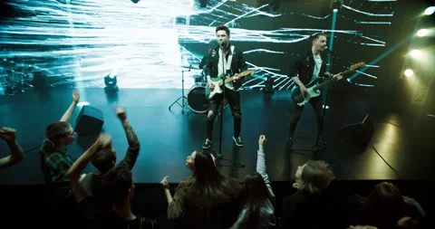 Jib shot of a rock band playing the gig ... | Stock Video | Pond5
