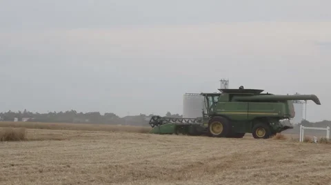 John Deere Combine Side View - Wheat Har... | Stock Video | Pond5