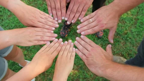 Joined hands as a team. Teamwork. Partne... | Stock Video | Pond5