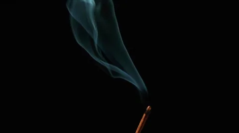 Joss stick on black background | Stock Video | Pond5