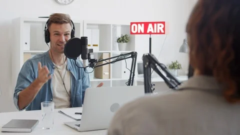 Joyful Interview in Broadcast Studio | Stock Video | Pond5