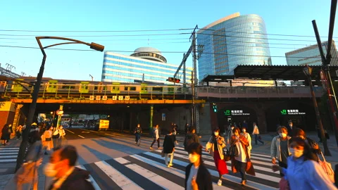 JR train runs on elevated railway track ... | Stock Video | Pond5