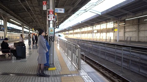 JR Train is seen at Osaka Loop bound for... | Stock Video | Pond5