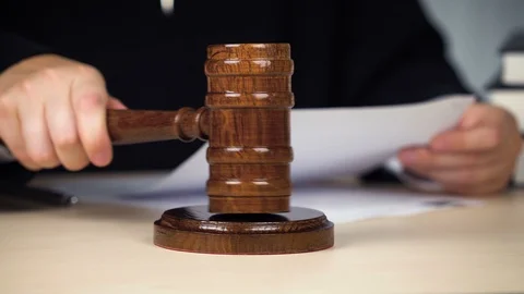 Judge calling to order, hitting the gave... | Stock Video | Pond5