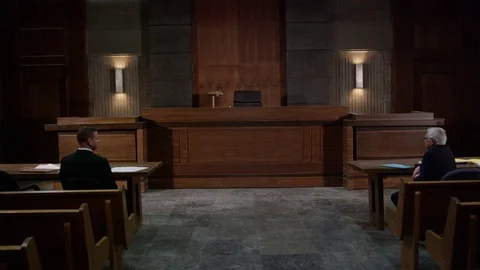 Judge entering court room from left door... | Stock Video | Pond5