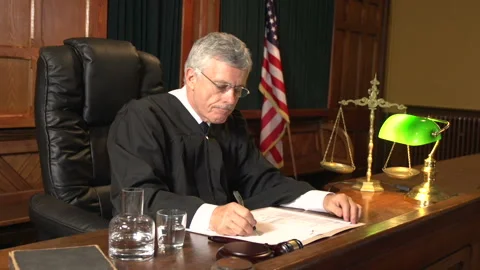 Judge taking notes in a Court during a h... | Stock Video | Pond5