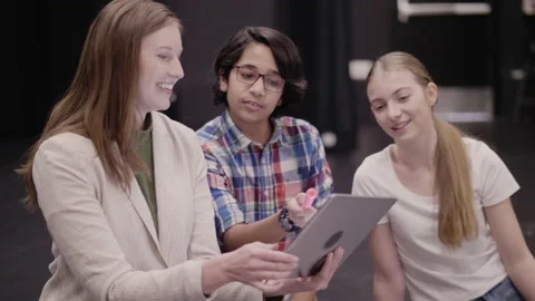 Junior high drama teacher and students u... | Stock Video | Pond5