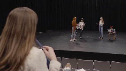 Junior high drama teacher watching and d... | Stock Video | Pond5