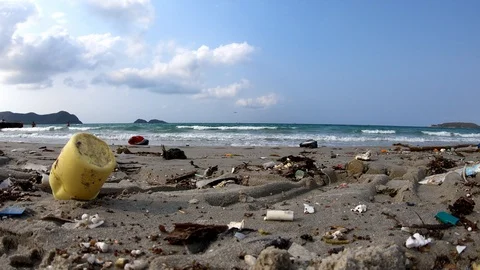 Junk garbage dirty on the beach environm... | Stock Video | Pond5