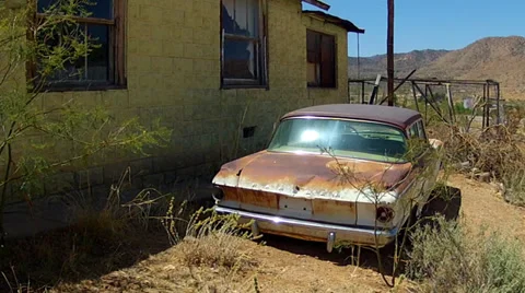 Junk Rusting Car Next To Derelict House ... | Stock Video | Pond5