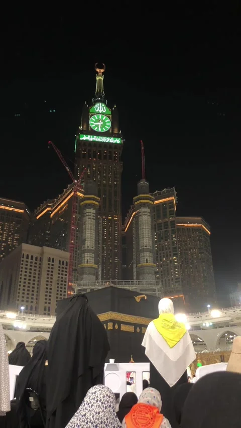 The Kaaba and Clock Royal Tower at Night | Stock Video | Pond5