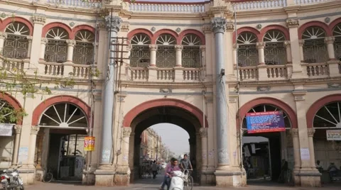 Kalavad gate with traffic passing throug... | Stock Video | Pond5