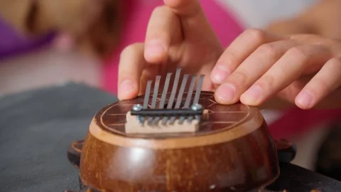 Kalimba turtle on a black background. Tr... | Stock Video | Pond5