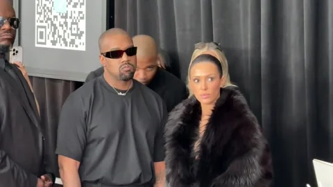 Kanye West returns to Grammys as wife Bi... | Stock Video | Pond5