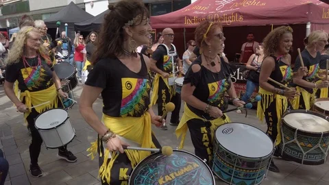 KATUMA Samba drum band playing in town c... | Stock Video | Pond5