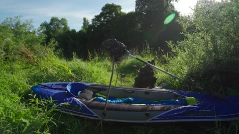A kayak camping man with sleeping setup ... | Stock Video | Pond5