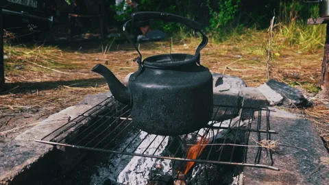 Kettle Boils on an Open Fire During the ... | Stock Video | Pond5