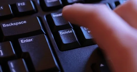 Keyboard hitting Delete key press | Stock Video | Pond5
