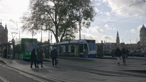 KFC tram train Amsterdam central station... | Stock Video | Pond5