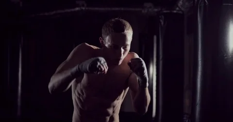 Kickboxer shadow boxing as exercise for ... | Stock Video | Pond5