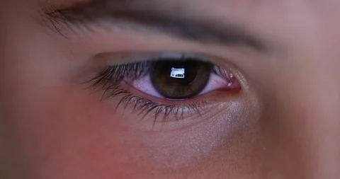 Kid boy eye staring at screen, red eye | Stock Video | Pond5