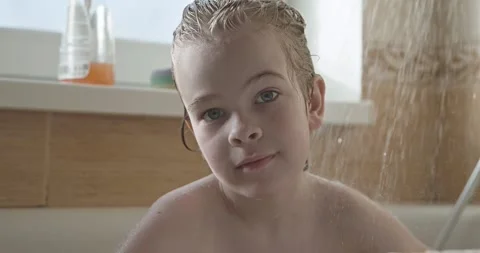Kid Boy Take Bath Shower in Bathroom. Ch... | Stock Video | Pond5