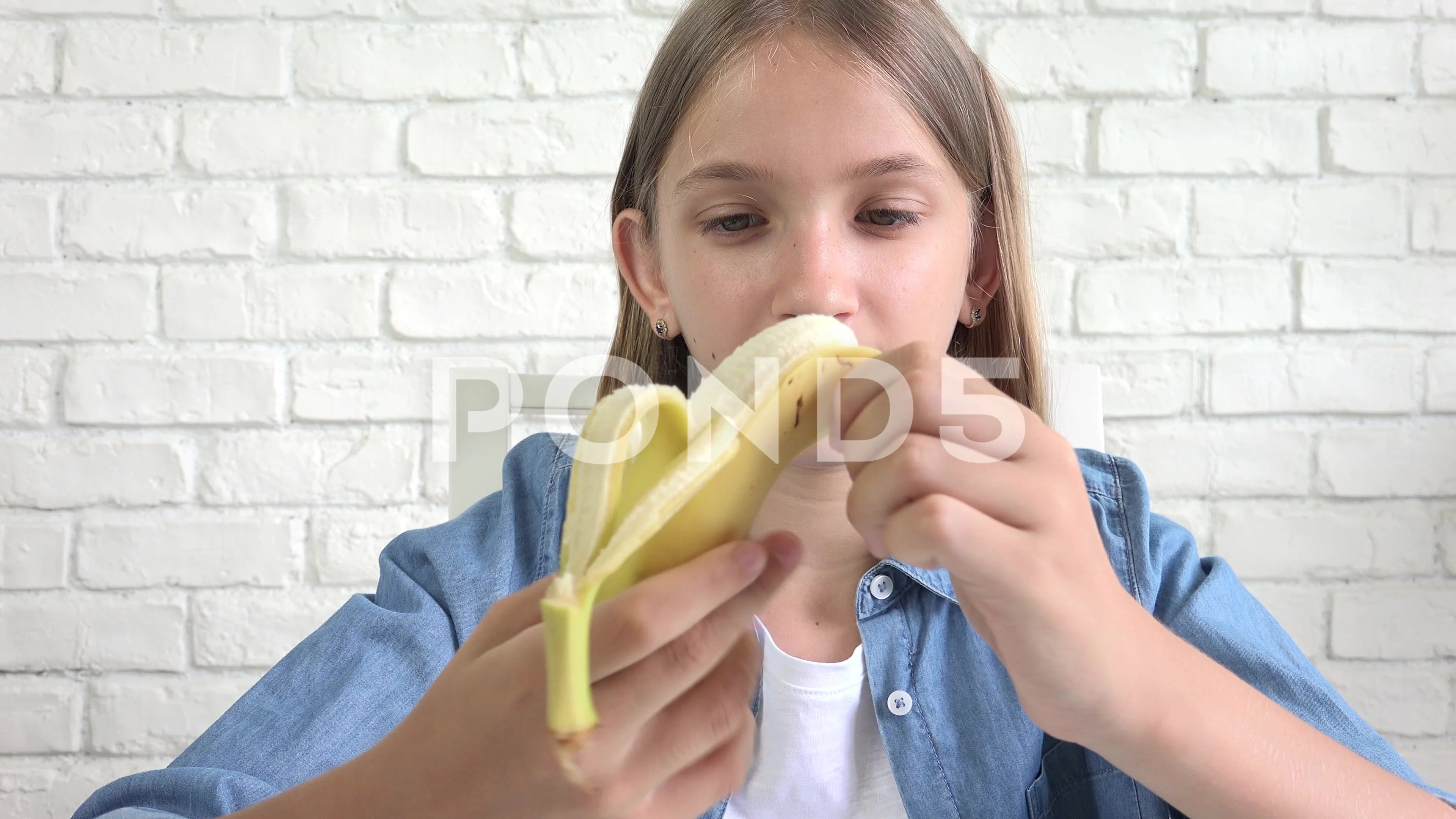 Boy Eating Banana