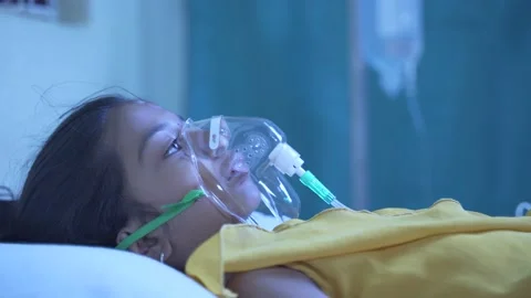 Kid Oxygen Mask Stock Footage ~ Royalty Free Stock Videos | Pond5