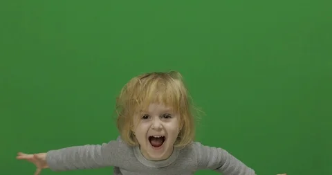 Kid girl on a Green Screen, Chroma Key. ... | Stock Video | Pond5