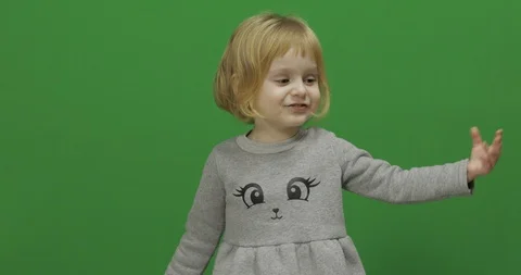 Kid girl on a Green Screen, Chroma Key. ... | Stock Video | Pond5