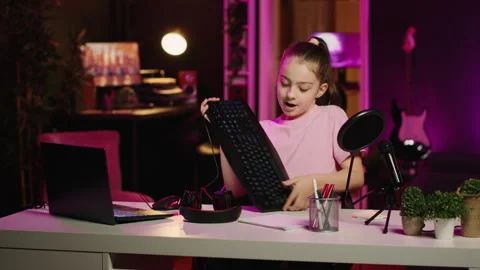 Kid influencer in studio using camera to... | Stock Video | Pond5
