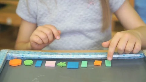 Kid learning counting with colors and sh... | Stock Video | Pond5