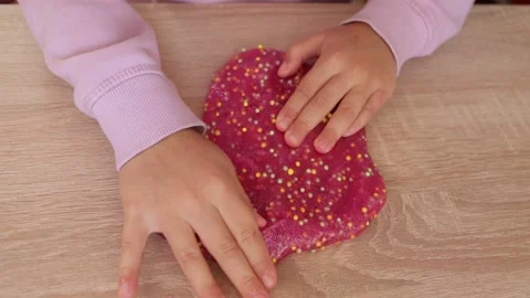 Kid playing with slime, child developmen... | Stock Video | Pond5
