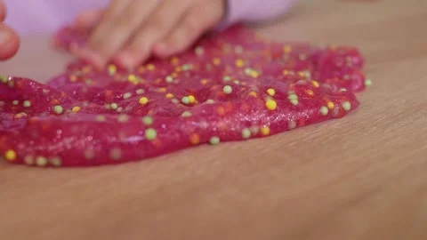 Kid playing with slime, child developmen... | Stock Video | Pond5