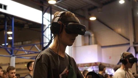 Kid playing VR in slow motion during an ... | Stock Video | Pond5