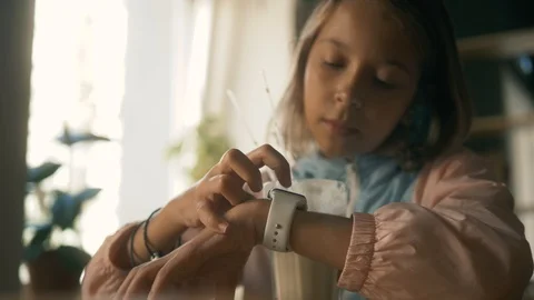 Kid Using Smartwatch or Smart Watch, sch... | Stock Video | Pond5