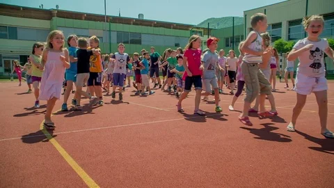 Kids are playing catch me if you can on ... | Stock Video | Pond5