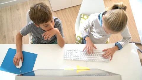 Kids in computer lab working on deskto... | Stock Video | Pond5