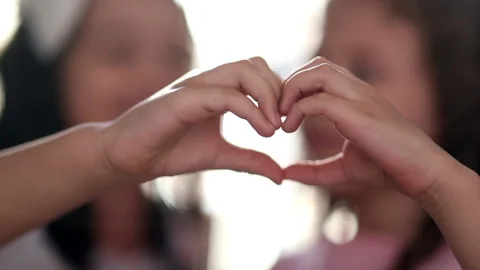 Kids doing heart symbol sign with hands ... | Stock Video | Pond5